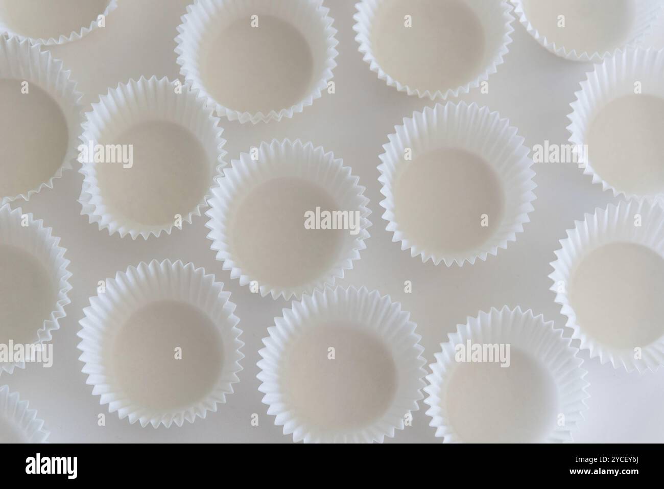 Paper muffin cups isolated on white background. Top view Stock Photo ...