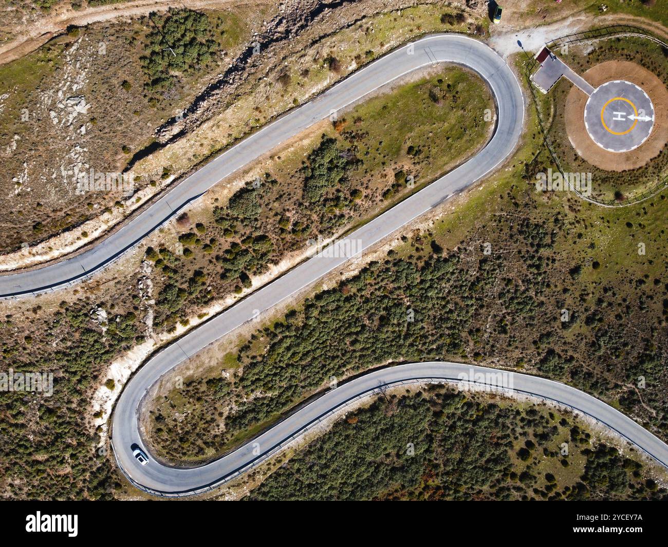 Aerial view of winding road. Splendid morning scene of asphalt roadway ...