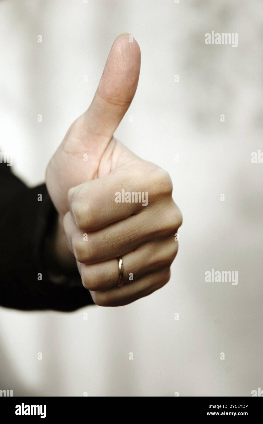 Hand Sign performing symbol language Stock Photo - Alamy