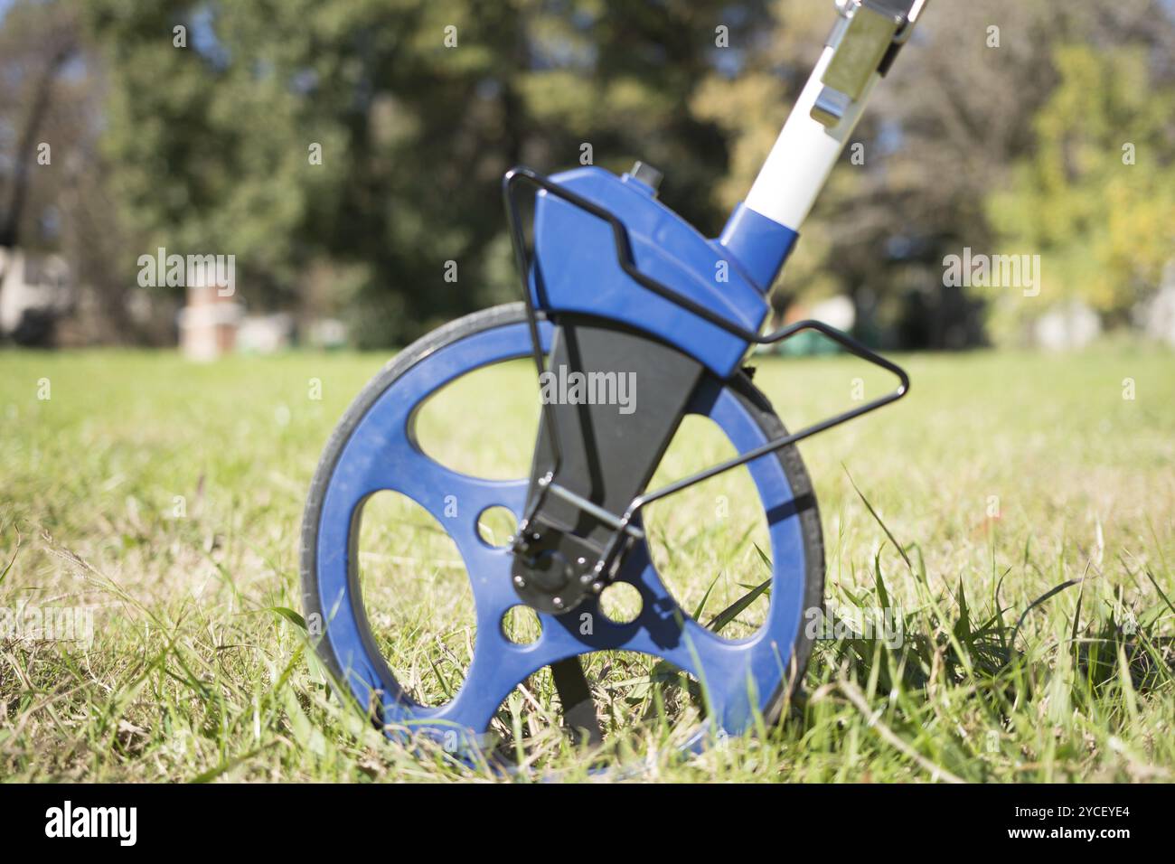 Surveyor Measurement Wheel Measuring outdoor ground length Stock Photo ...
