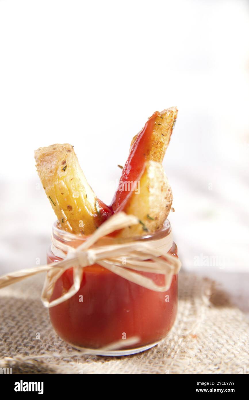 Presentation of a plate of homemade potato chips Stock Photo - Alamy