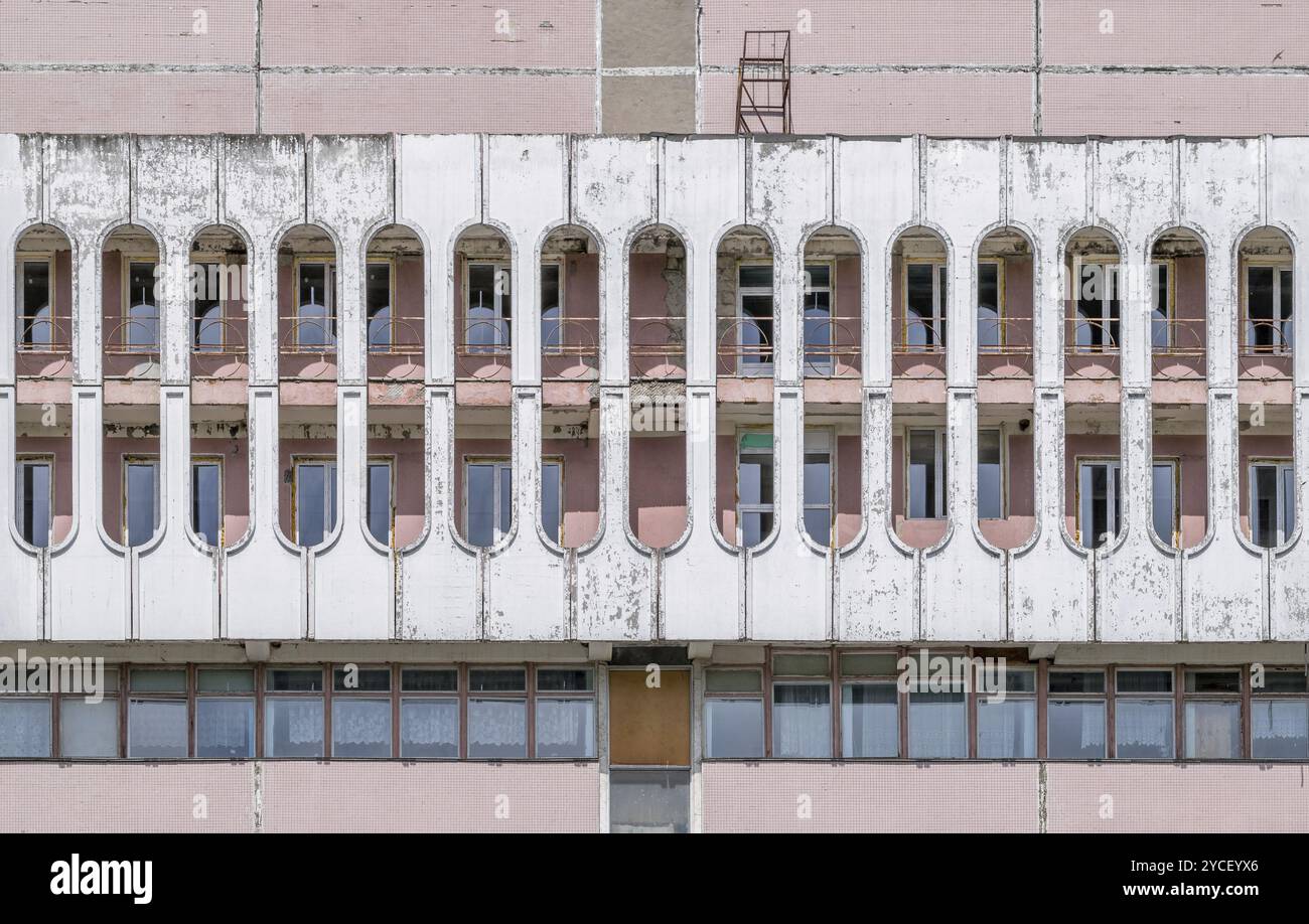 Cylinder shapes of a soviet era building in red white brick Stock Photo ...
