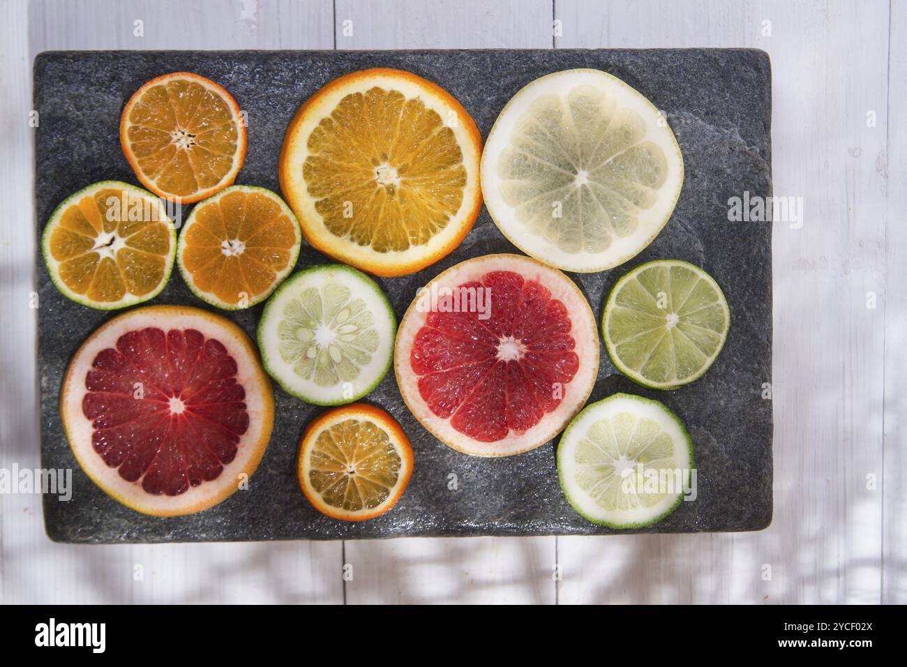 Presenting a blend of citrus slices of different types Stock Photo - Alamy