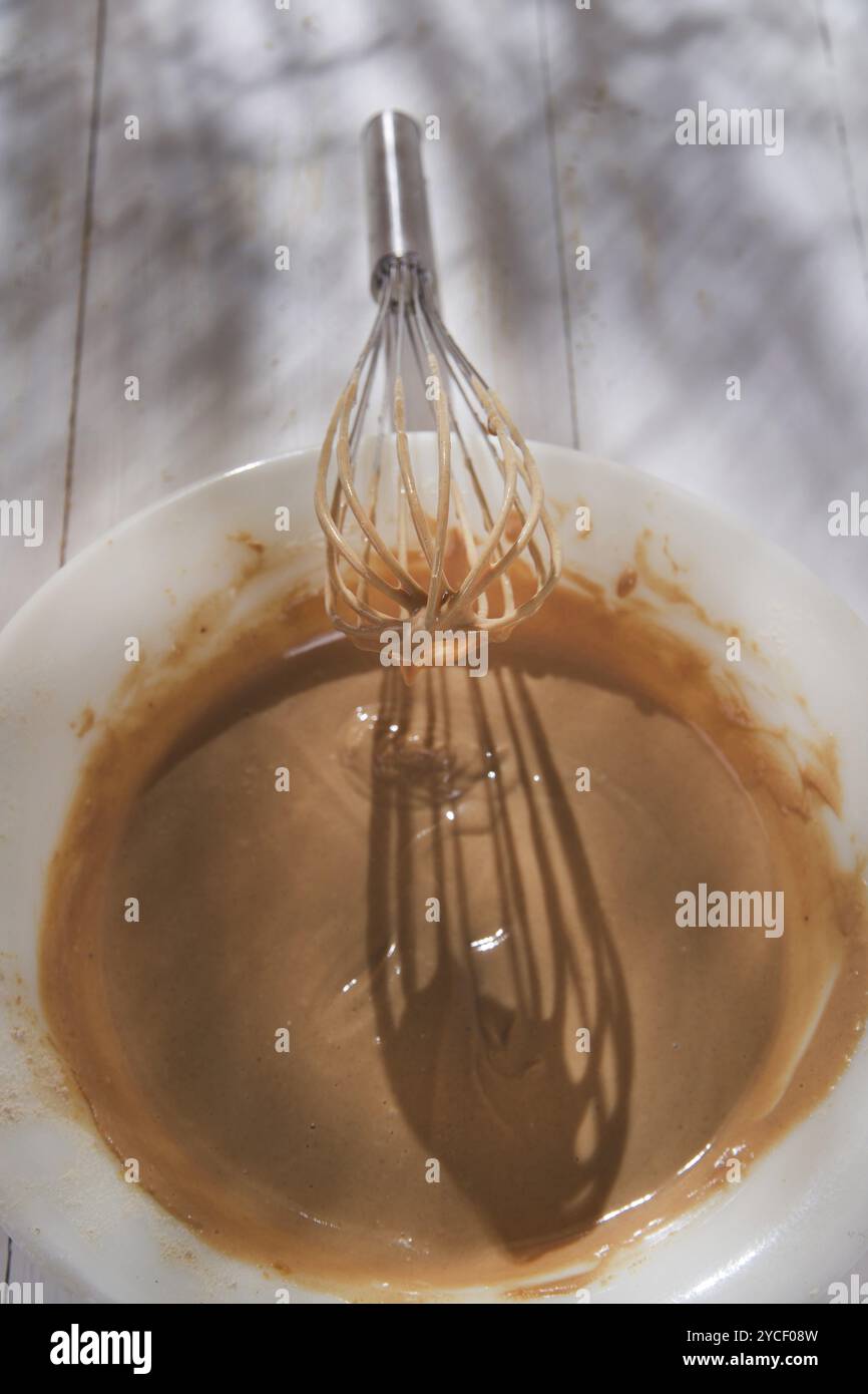 Whip for the preparation of the cream of chestnut flour Stock Photo - Alamy