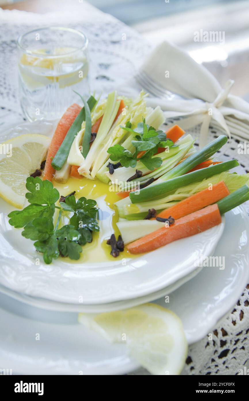 Preparation and presentation of mixed vegetables for garnish Stock ...