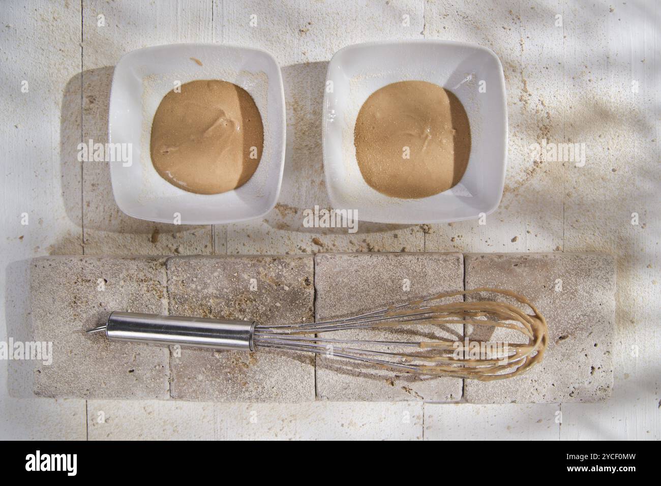 Whip for the preparation of the cream of chestnut flour Stock Photo - Alamy