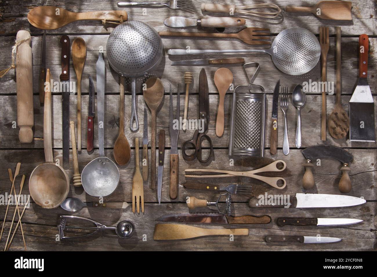 Old and various accessories for the preparation of food Stock Photo - Alamy