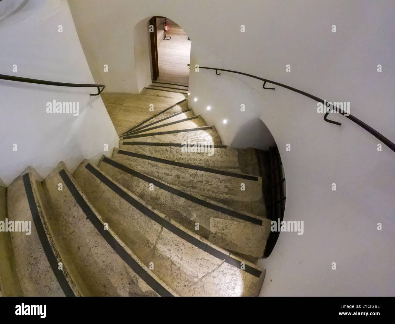 Old spiral staircase with metal railing, galleria Borghese, Rome, Italy ...