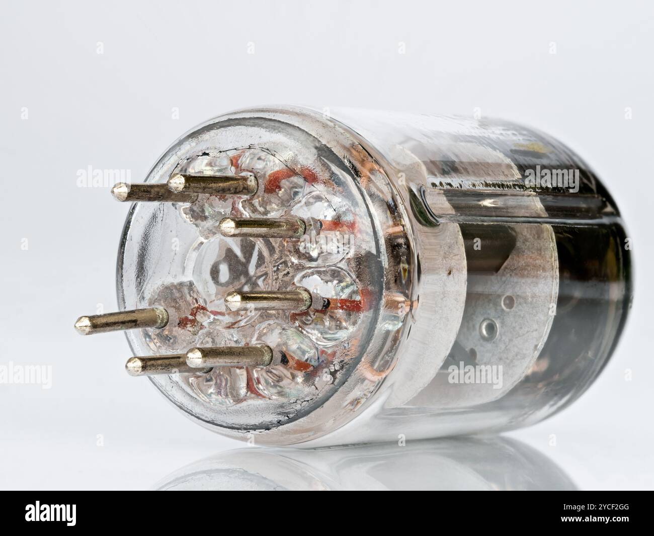 Macro close-up photo of 7 contacts of an old Soviet radio tube isolated ...