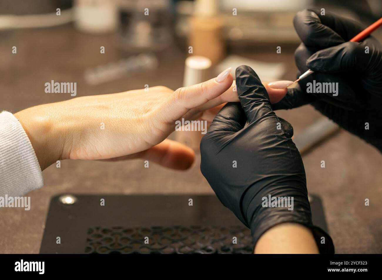Manicure care procedure closeup view hi-res stock photography and ...