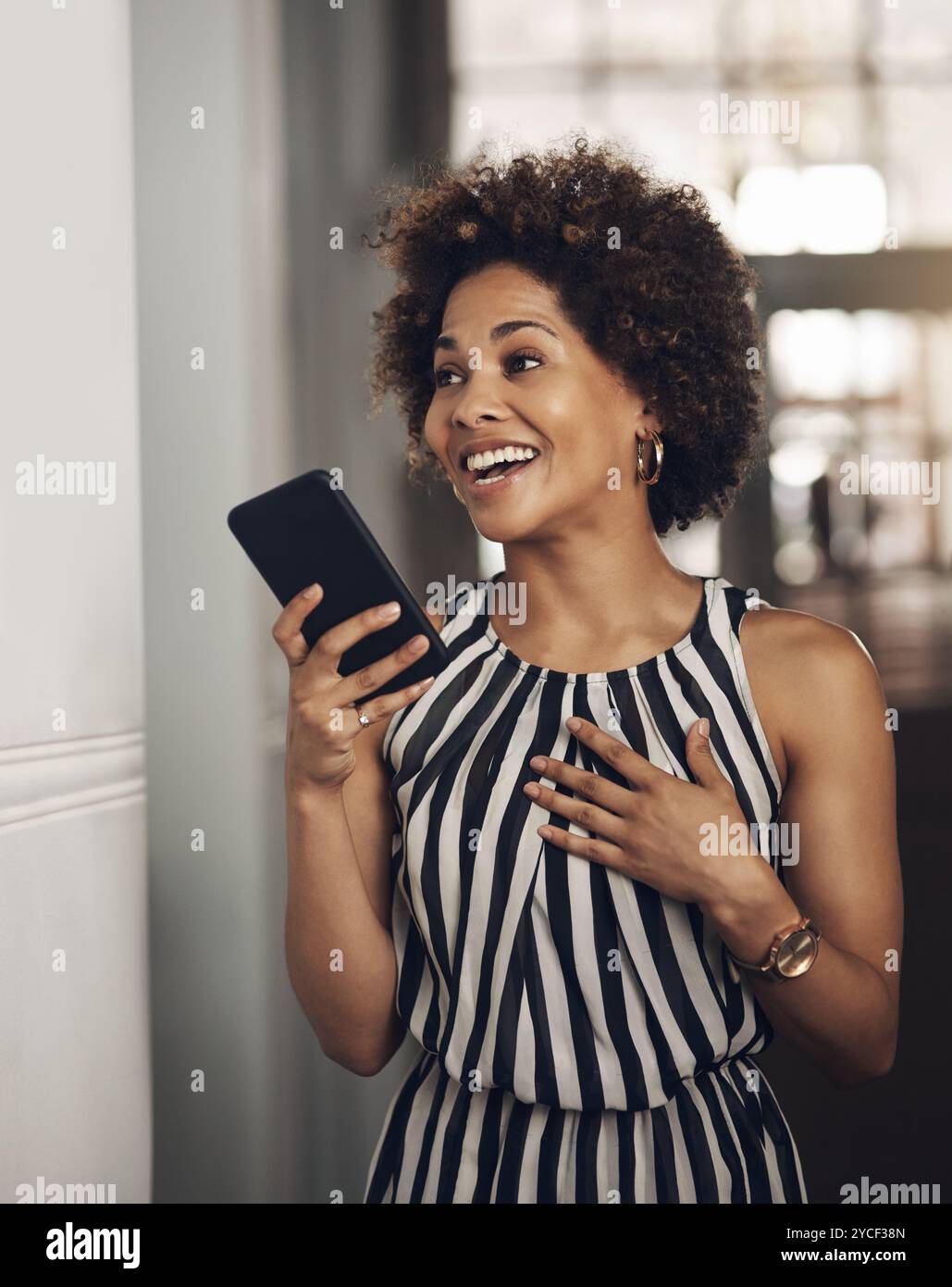 Woman, phone speaker and talking in office, communication and employee ...