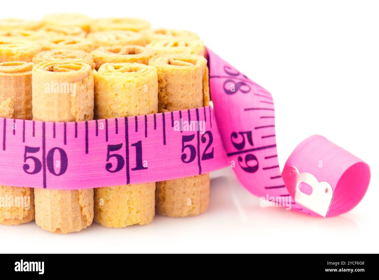 Unhealthy eating concept: Cakes rounded inch scale measuring tape ...