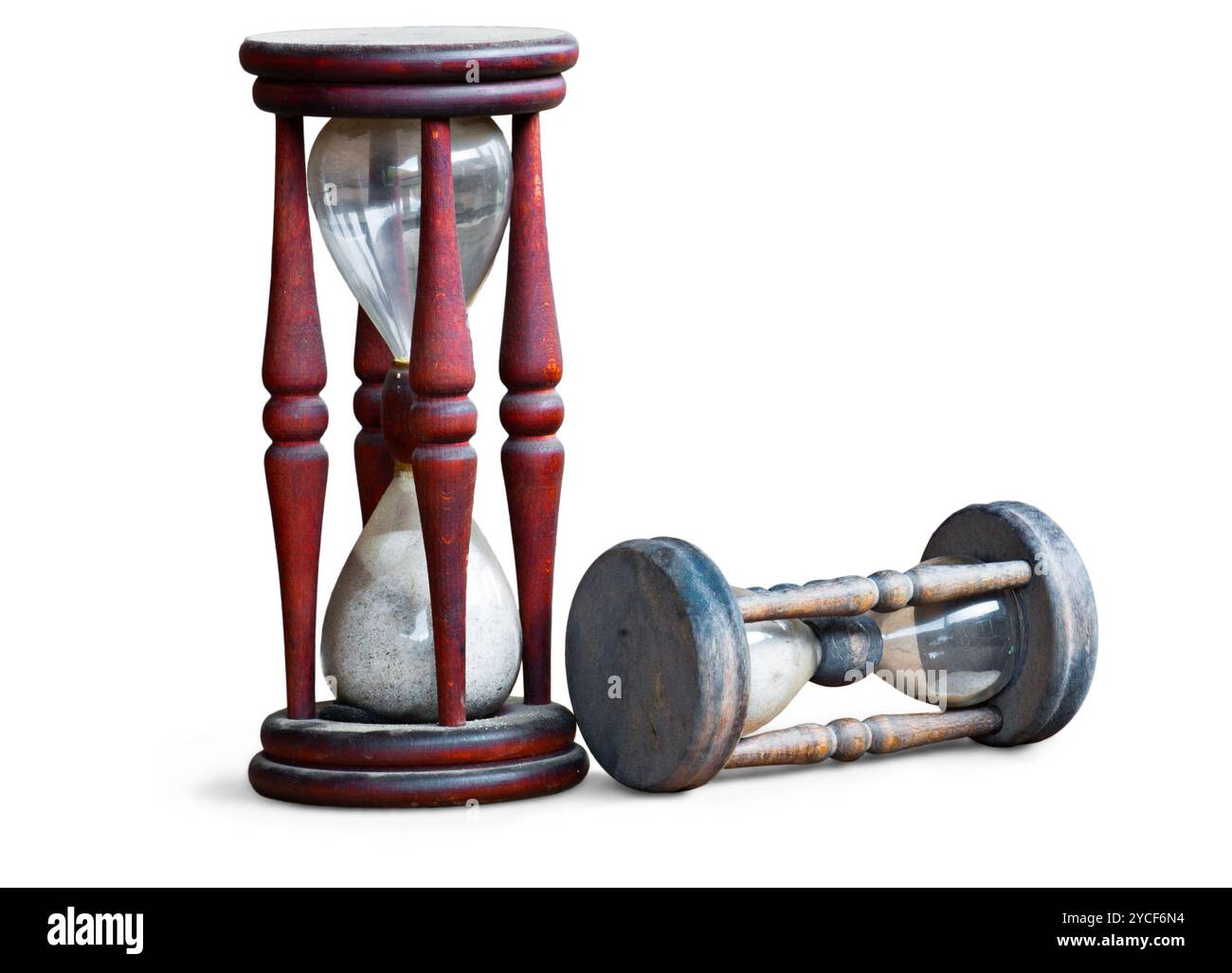 Two old dusty wooden sand clocks, over white background Stock Photo - Alamy
