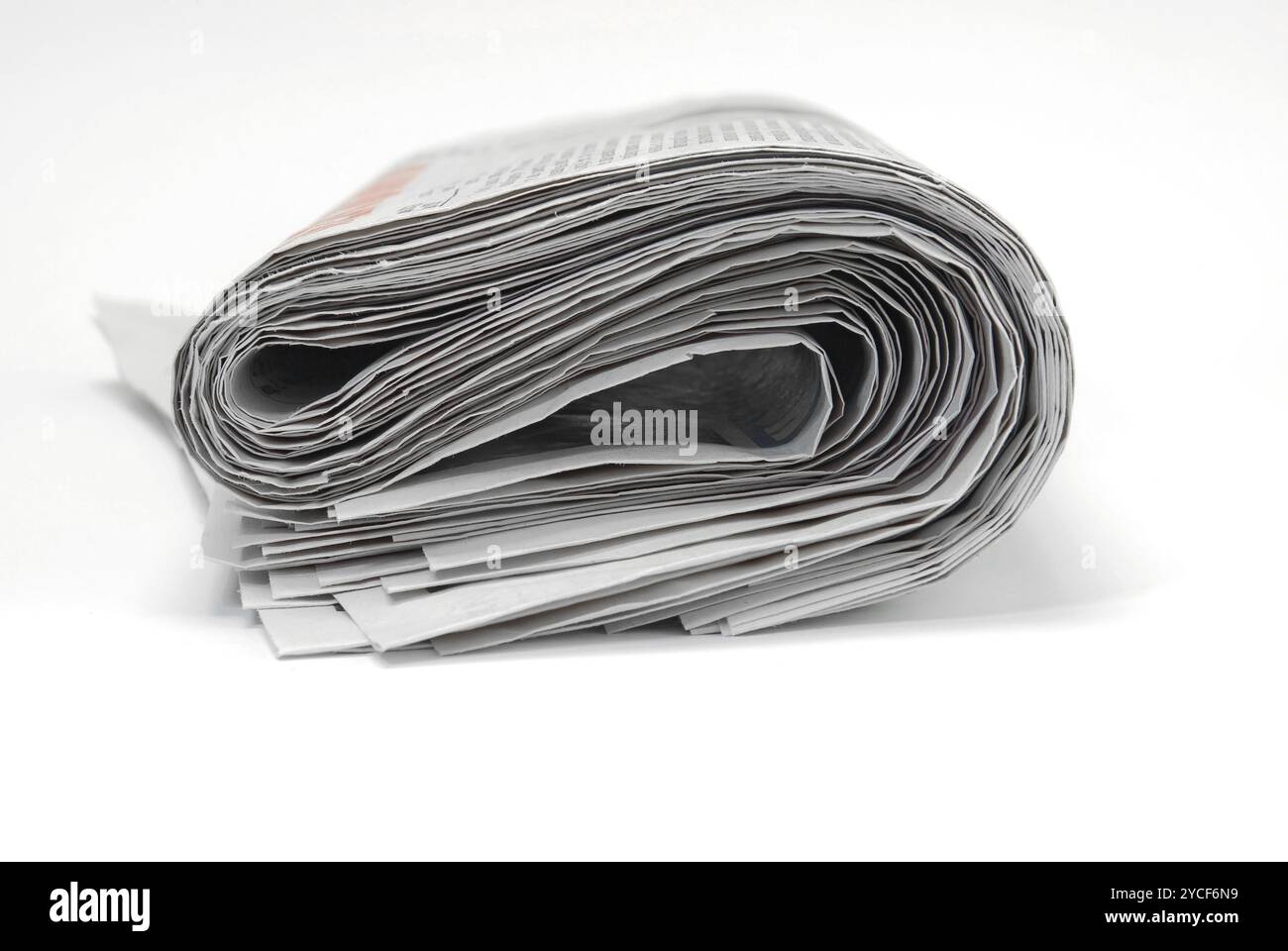 Roll of old newspapers Stock Photo - Alamy