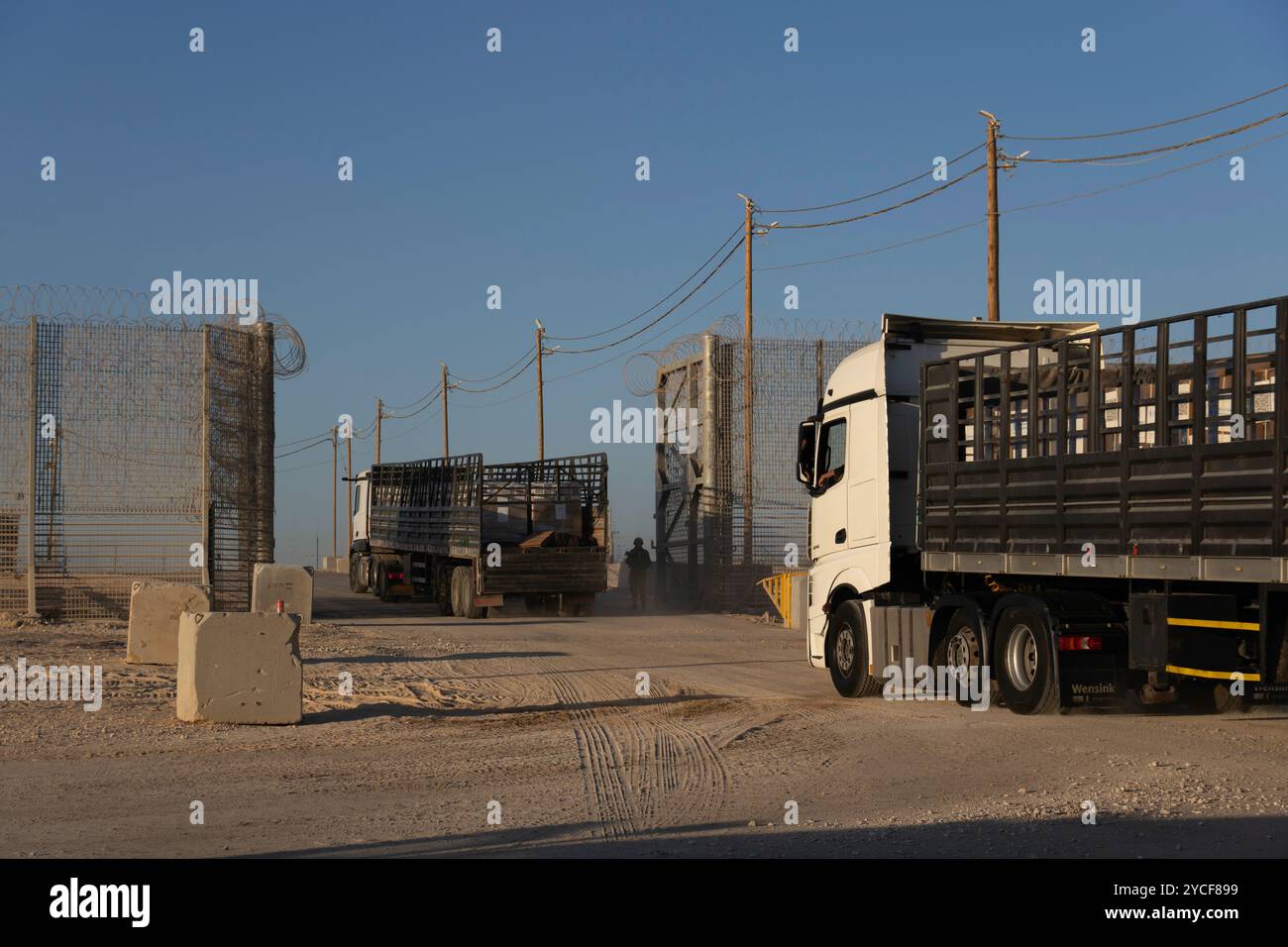 EREZ CROSSING, ISRAEL - OCTOBER 21: Trucks carrying humanitarian aid ...