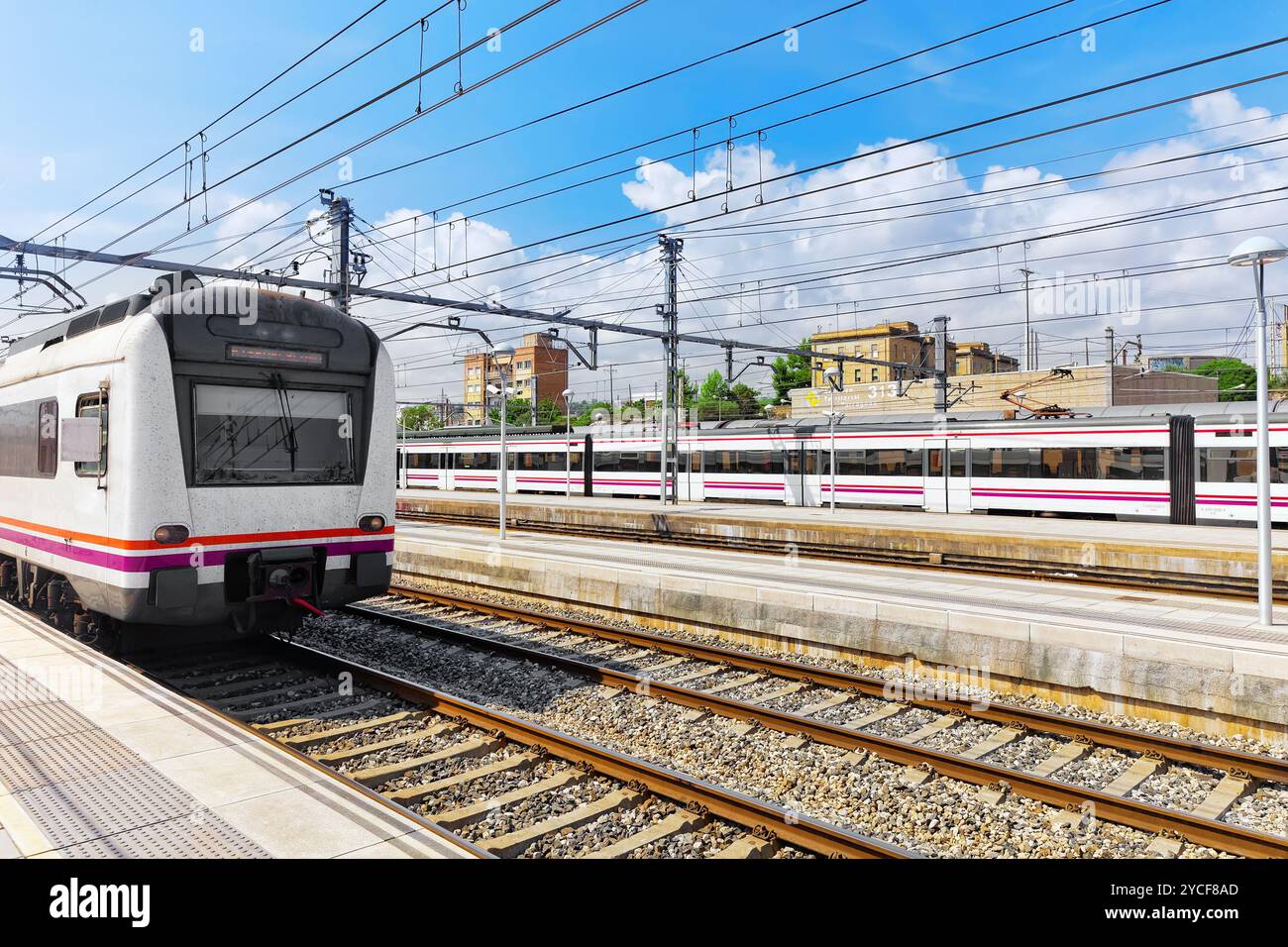 Suburban railway train at the railways stantion Stock Photo - Alamy