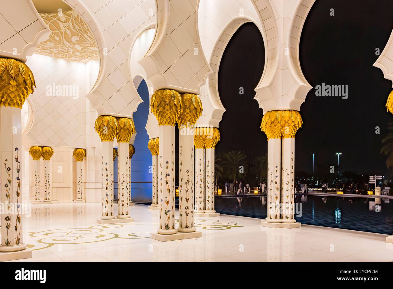 Decorated columns, Colonnade, Sheikh Zayed Mosque, Evening lighting ...