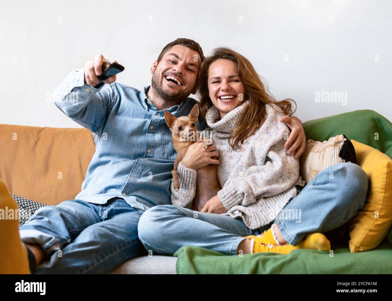 Family watching movie winter hi-res stock photography and images - Alamy
