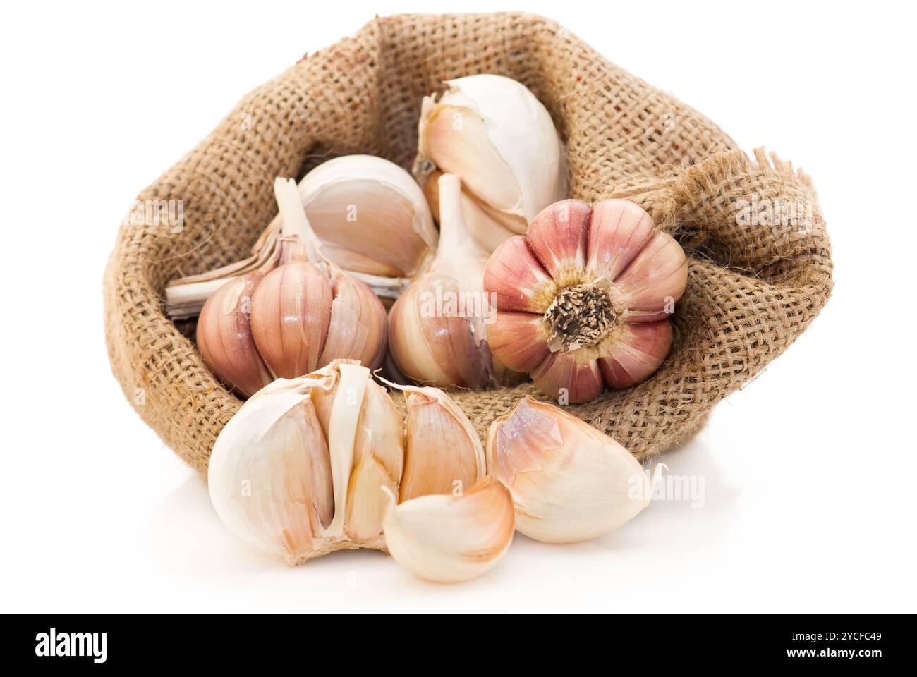 Garlic in canvas sack Stock Photo - Alamy