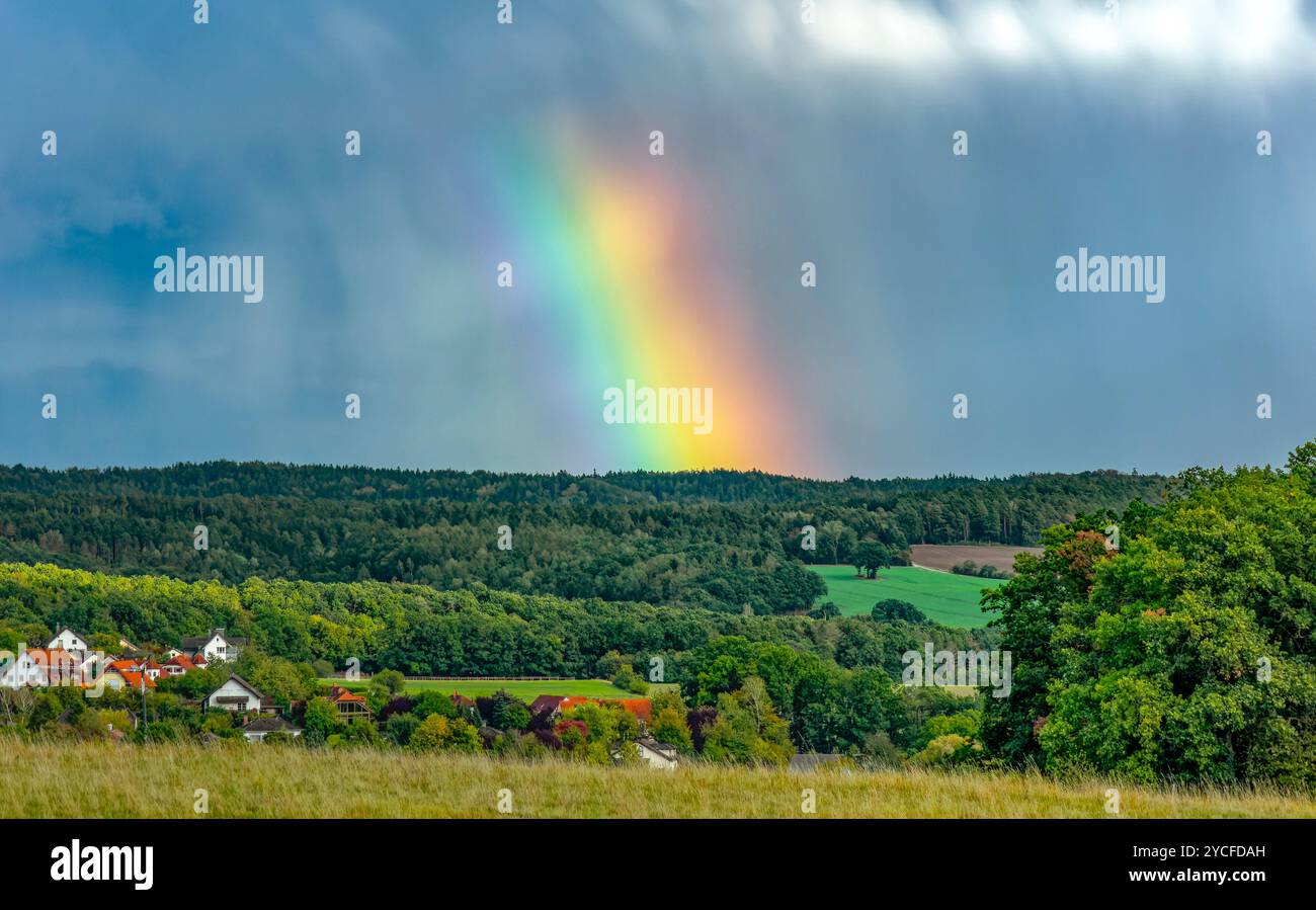 Atmospheric landscape with rainbow fragment near in the coburg region ...