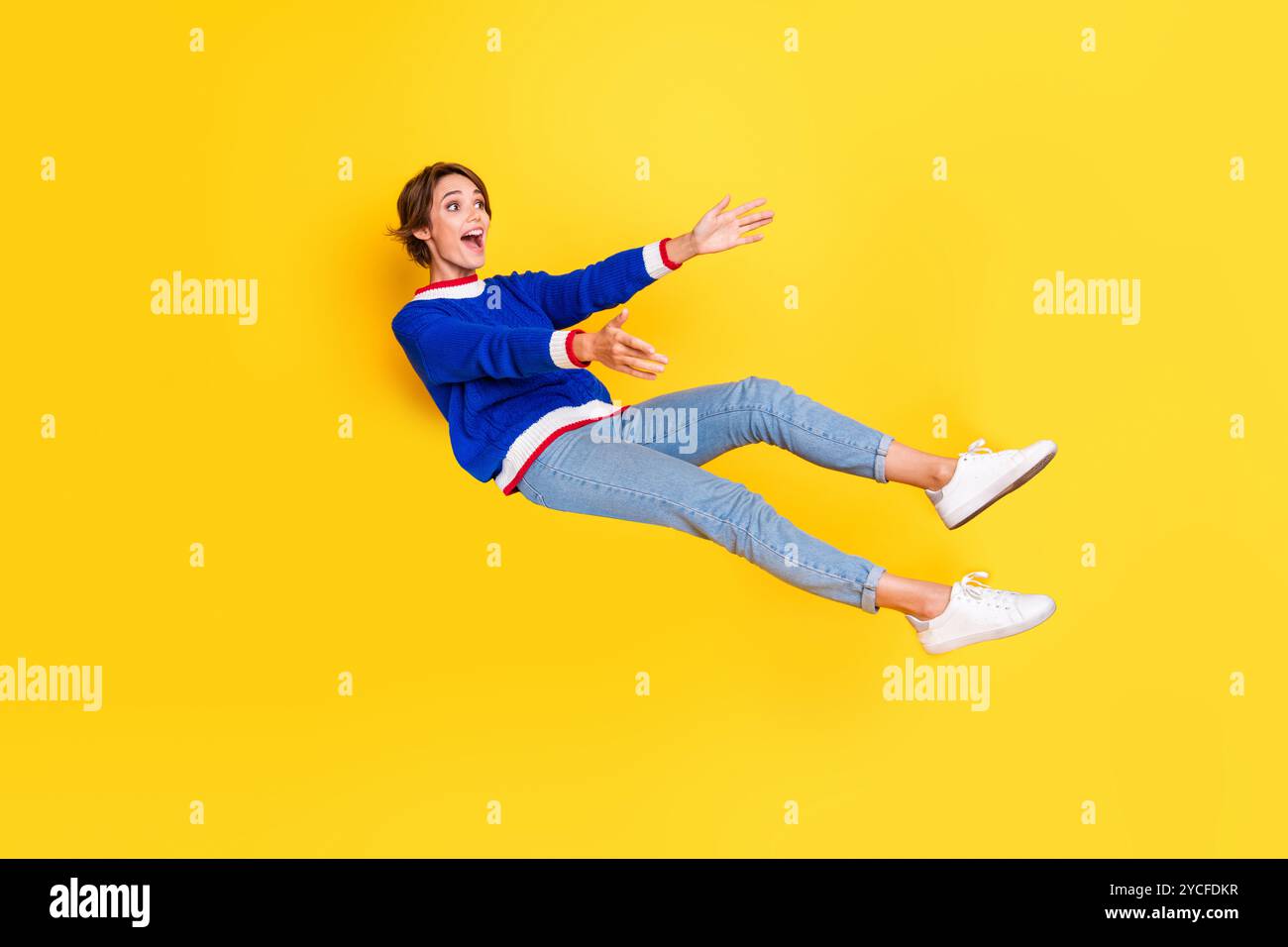 Full length photo of funky positive girl wear blue pullover falling ...