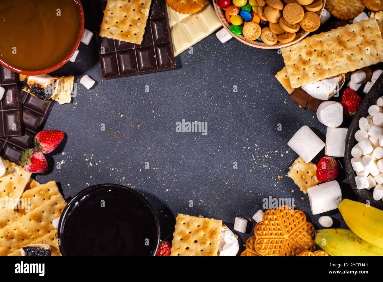 S'mores home party food and ingredients. Smores buffet background with ...