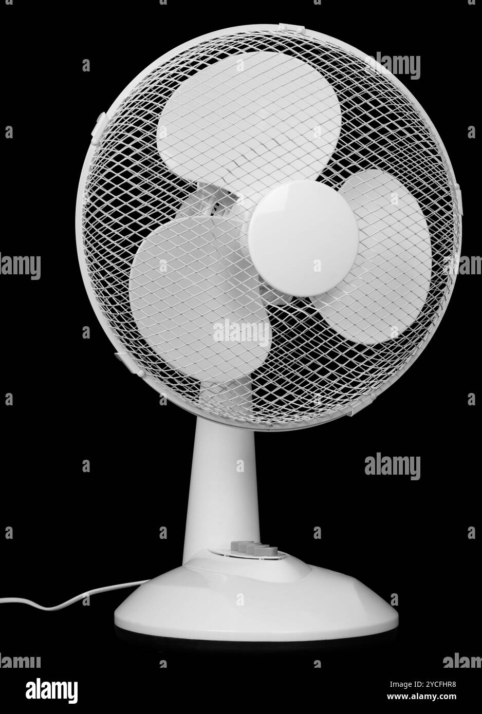 Office fan isolated on black background Stock Photo - Alamy