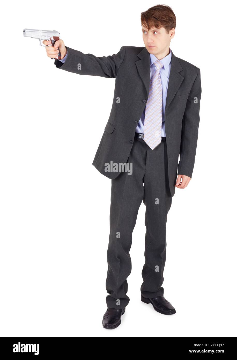Young man aiming a firearm on white background Stock Photo - Alamy
