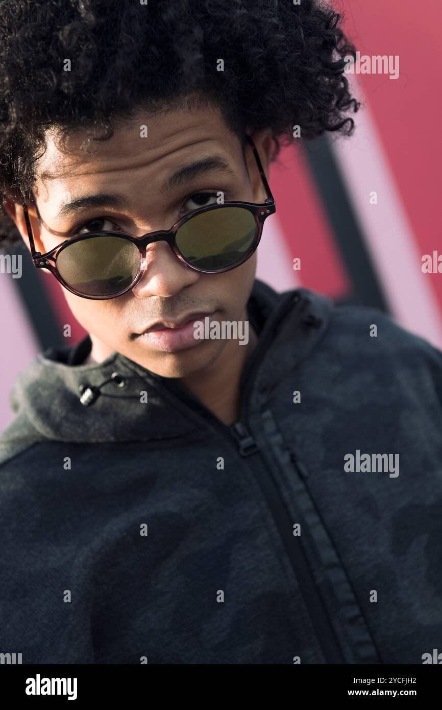 Man curly hair sunglasses hi-res stock photography and images - Alamy