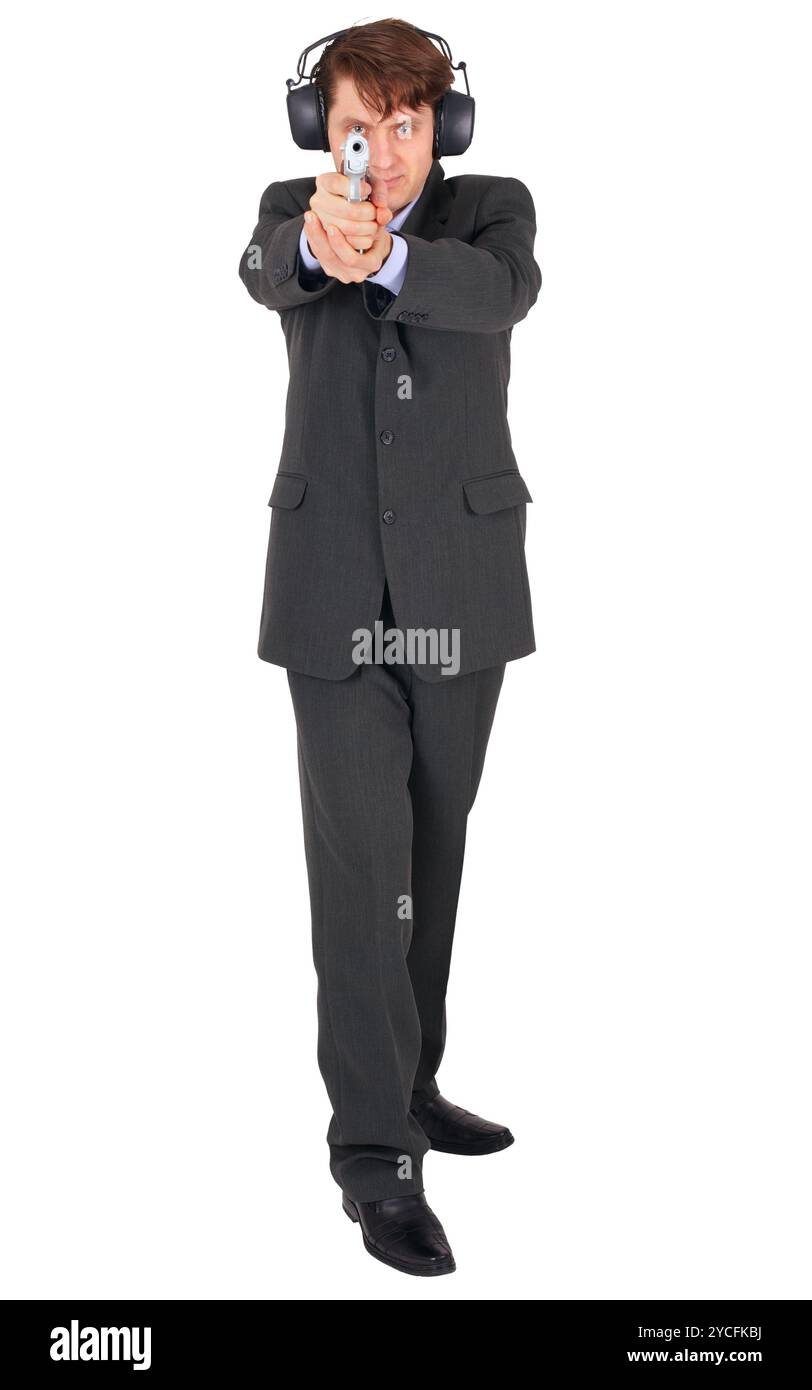 Man practicing at shooting range firing gun Stock Photo - Alamy