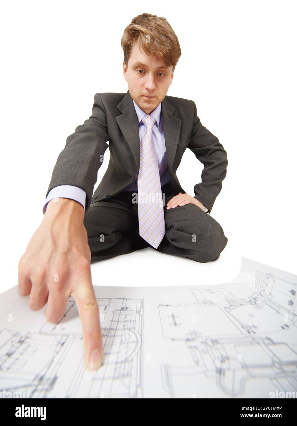 Engineer points a finger details on drawing Stock Photo - Alamy