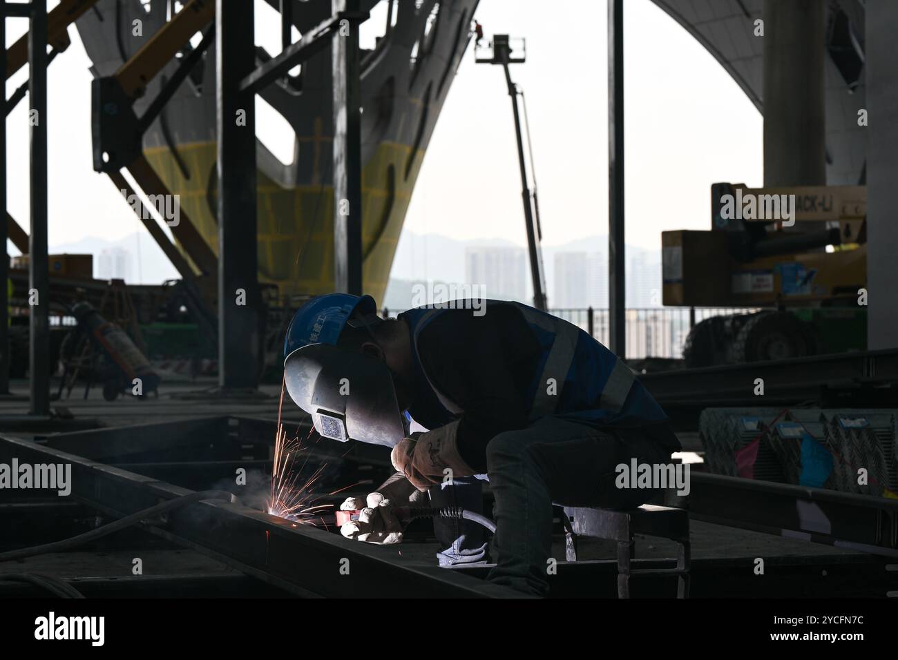 Chongqing,China.22th October 2024. Construction workers from CREC work ...
