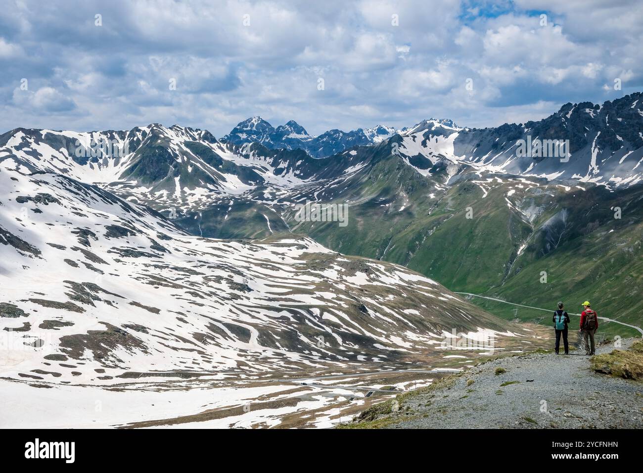Hiker on hiking trail above the stilfser joch pass road hi-res stock ...