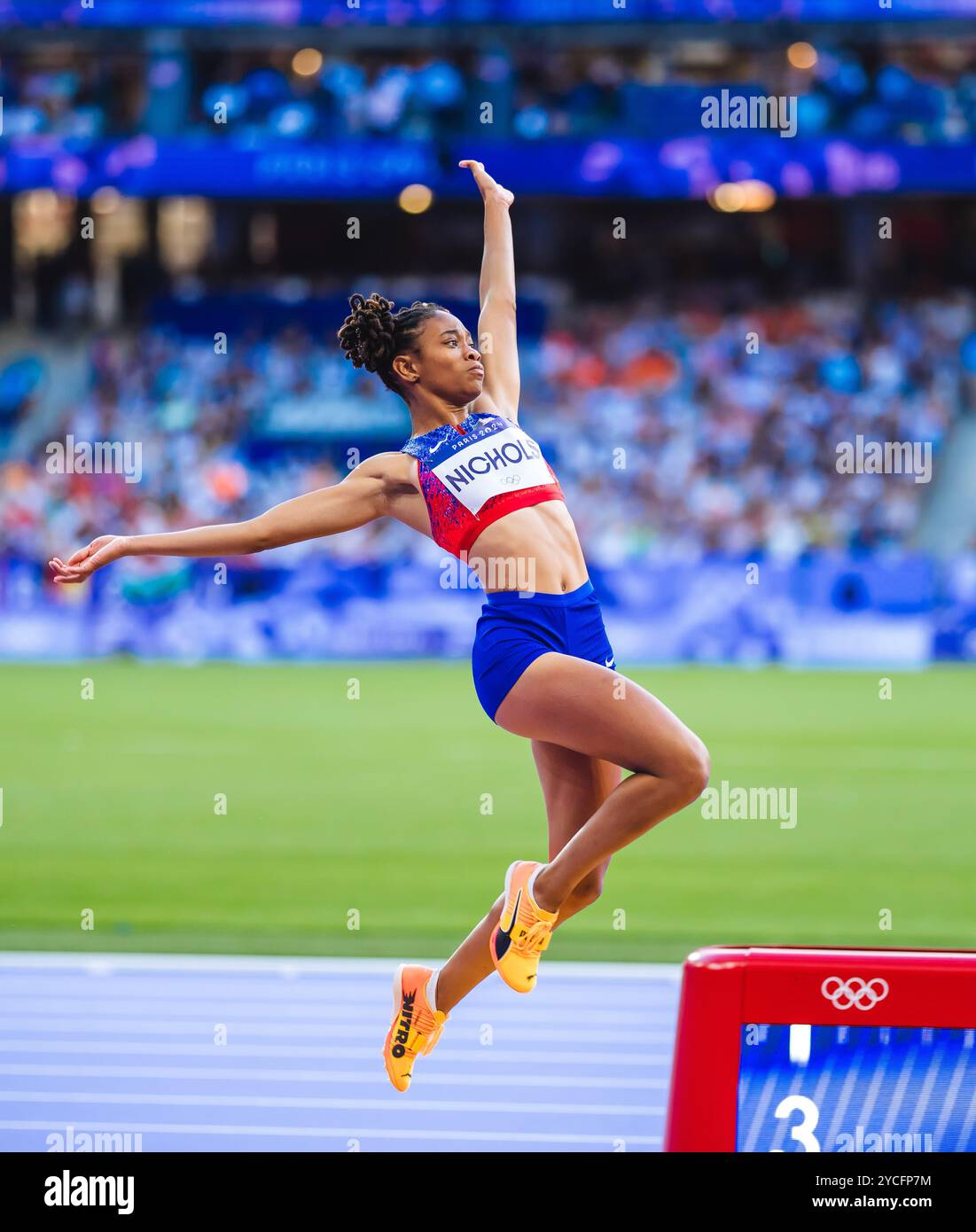 Monae' Nichols participating in the long jump at the Paris 2024 Olympic ...