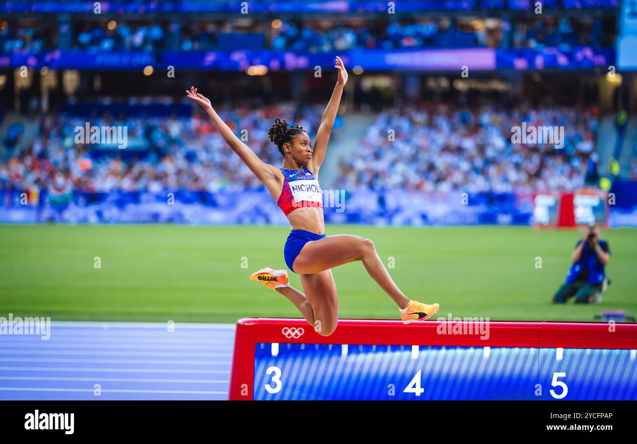 Monae' Nichols participating in the long jump at the Paris 2024 Olympic ...