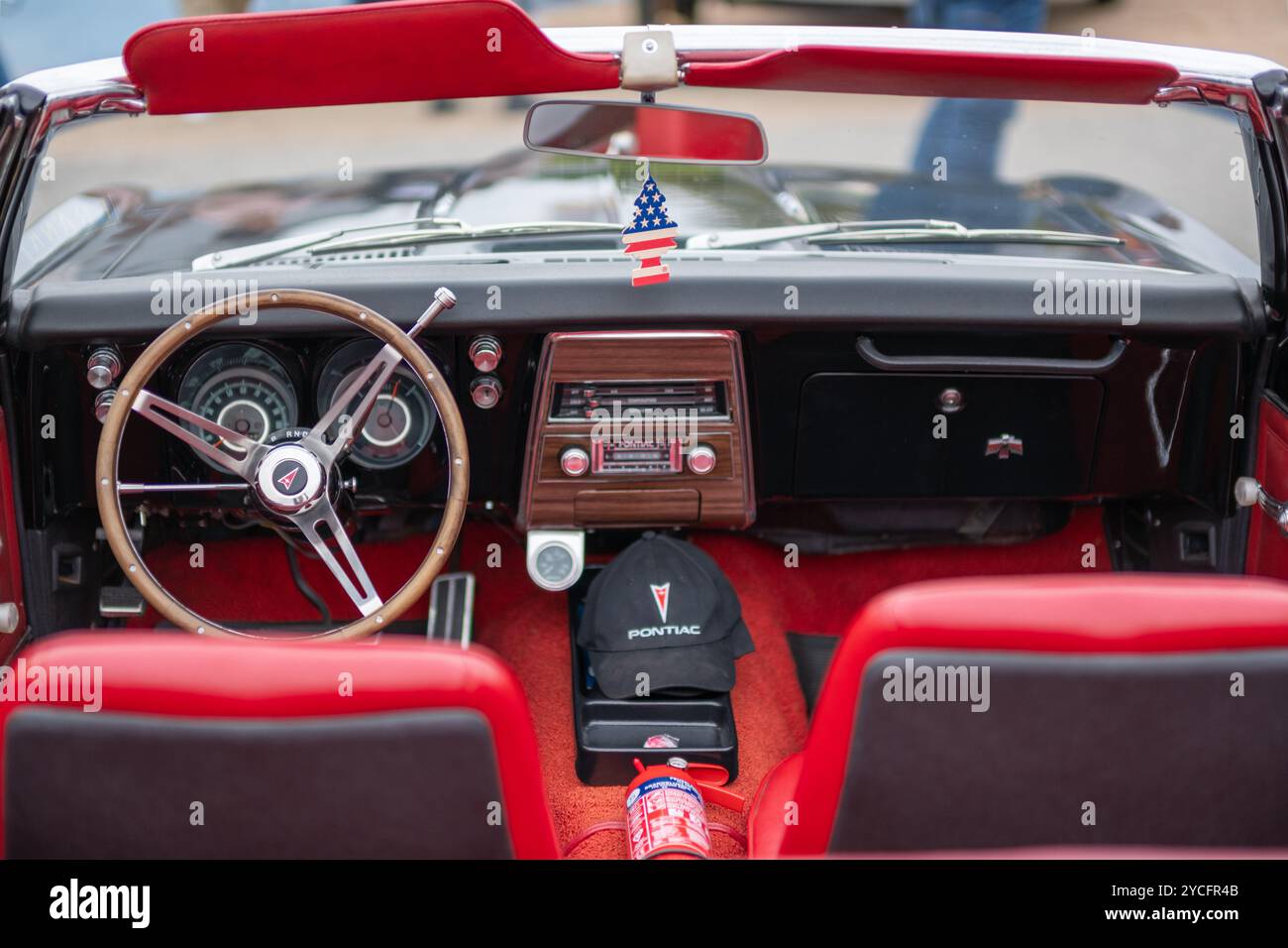 Interior view of a classic Pontiac featuring a stylish steering wheel ...