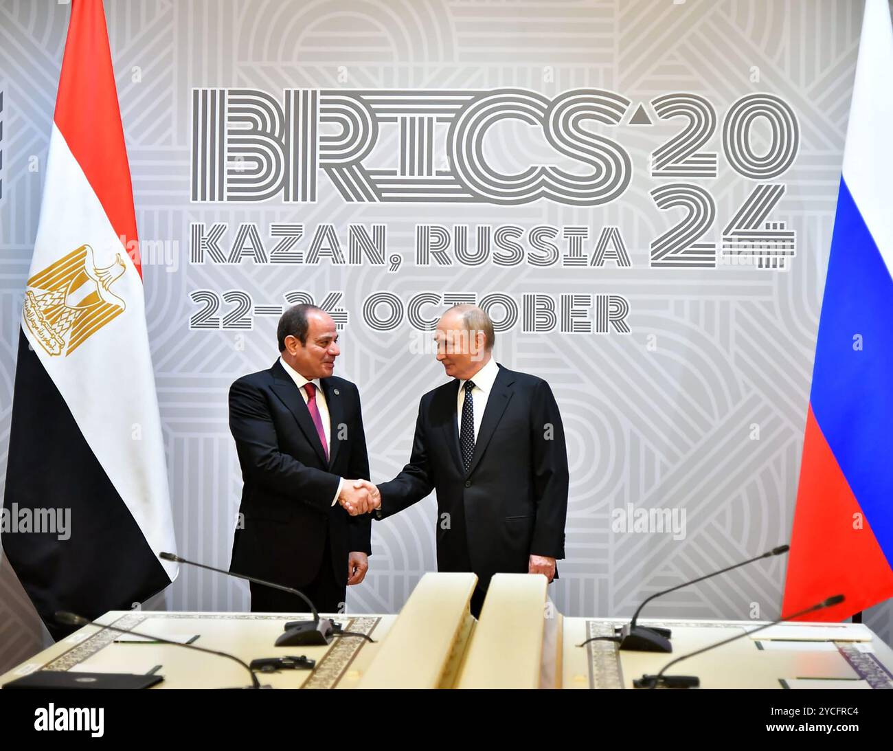 22 October 2024 Kazan, Russia Russian President Vladimir Putin greets ...