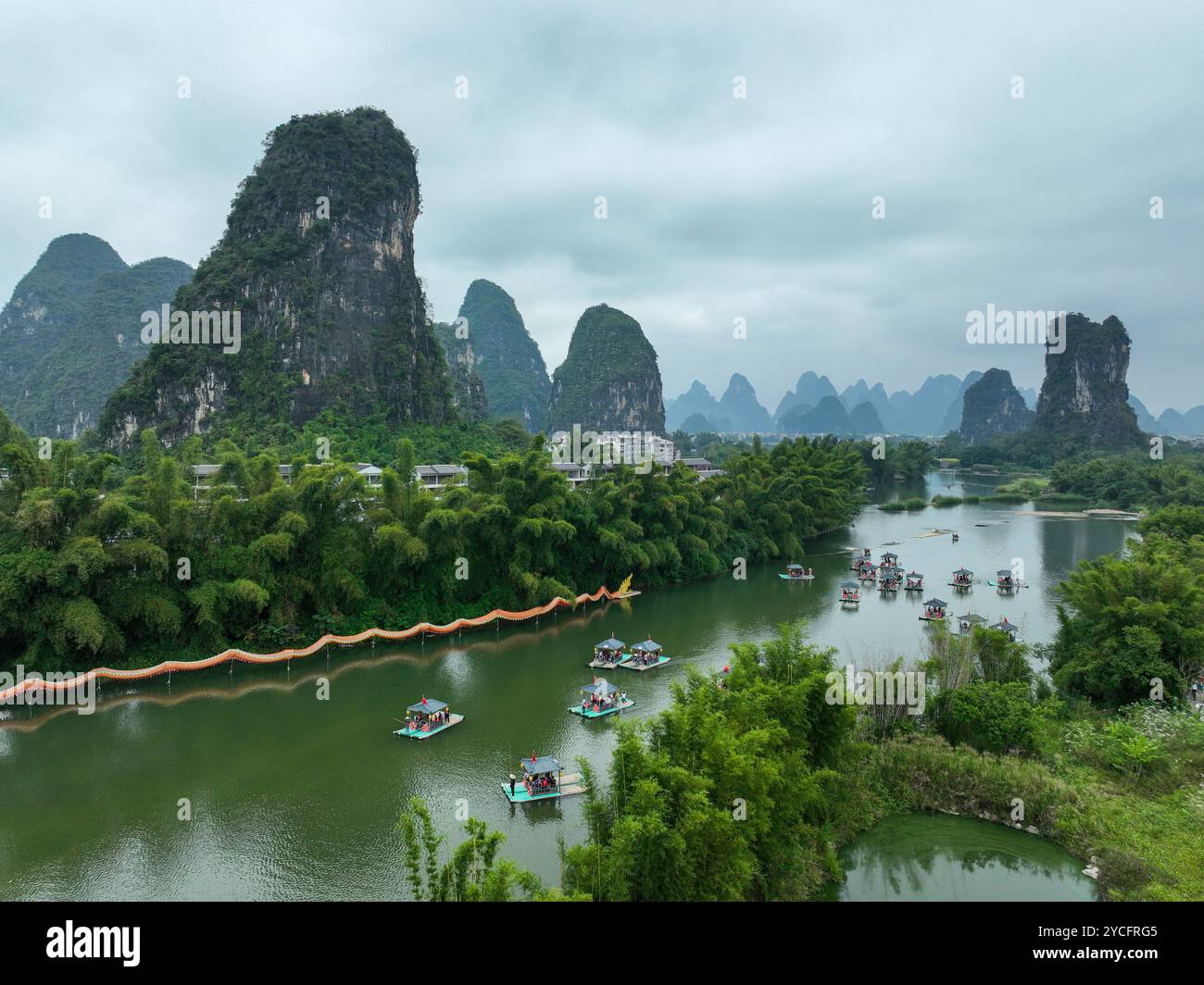 Guilin,China.22th October 2024. The bamboo rafts carrying tourists to ...