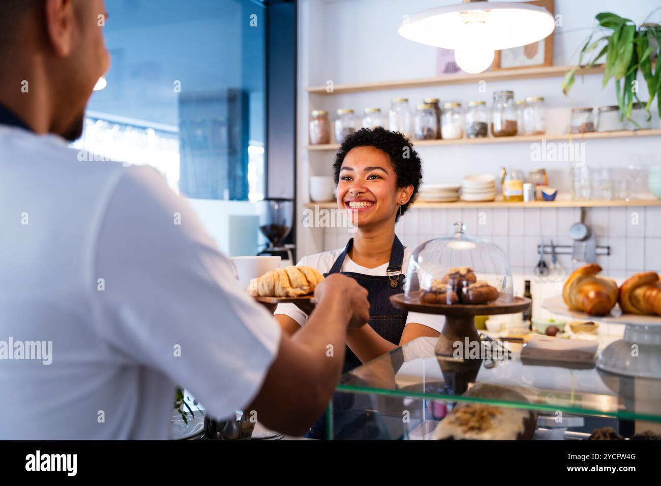 Cappuccino ready drink! waiter man hi-res stock photography and images ...