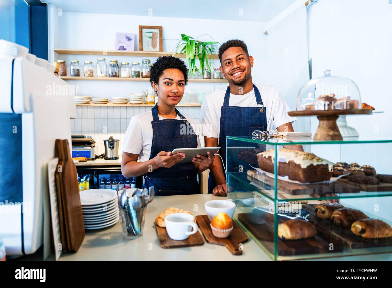 Cappuccino ready drink! waiter man hi-res stock photography and images ...