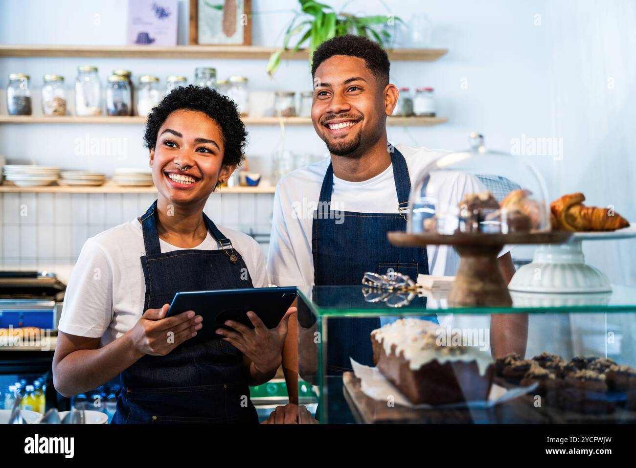 Cappuccino ready drink! waiter man hi-res stock photography and images ...