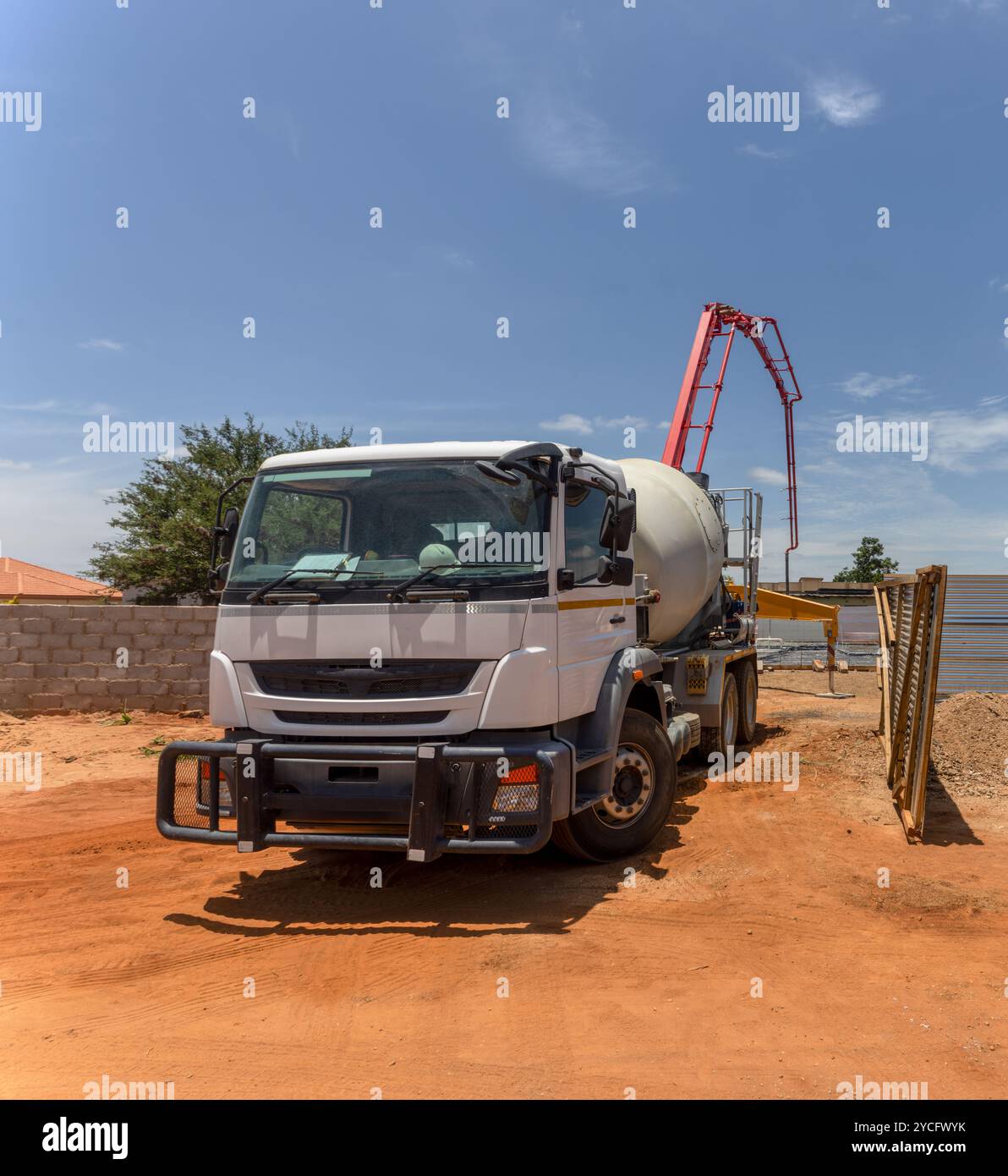 a boom concrete pump on the construction site unloading Stock Photo - Alamy