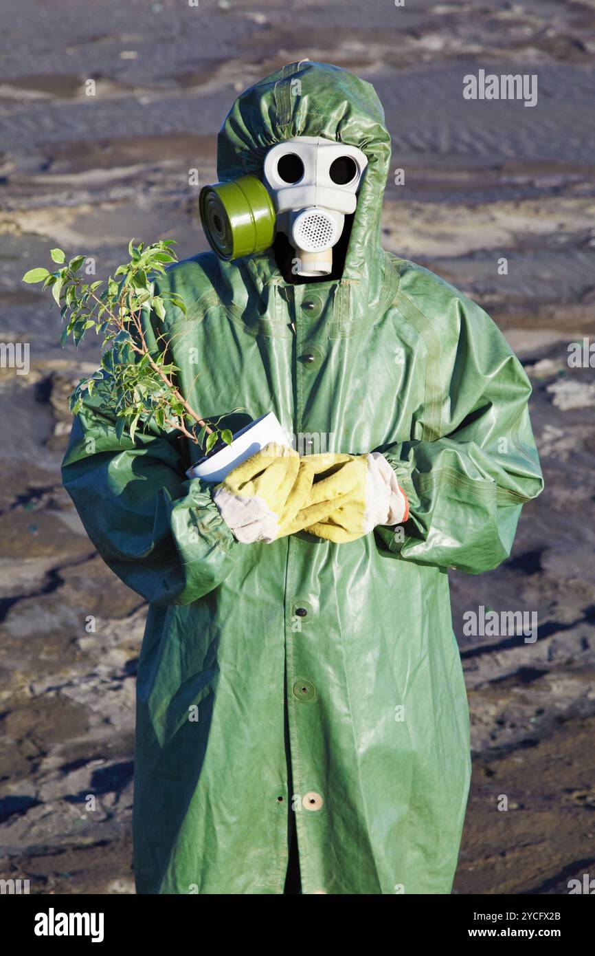 Scientific Environmentalist gently hugs a plant Stock Photo - Alamy