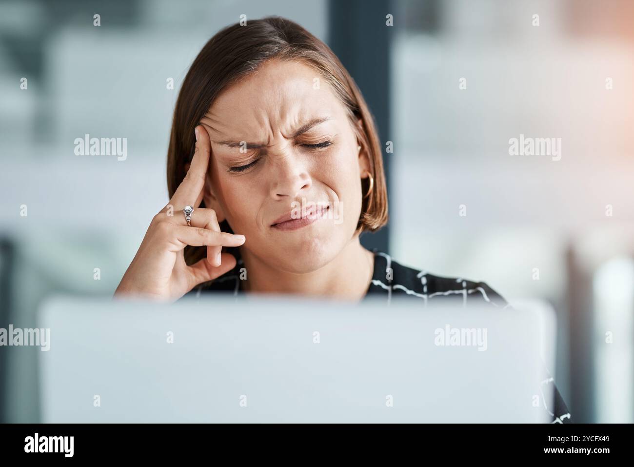 Corporate, woman and headache with laptop in office for fatigue, brain ...
