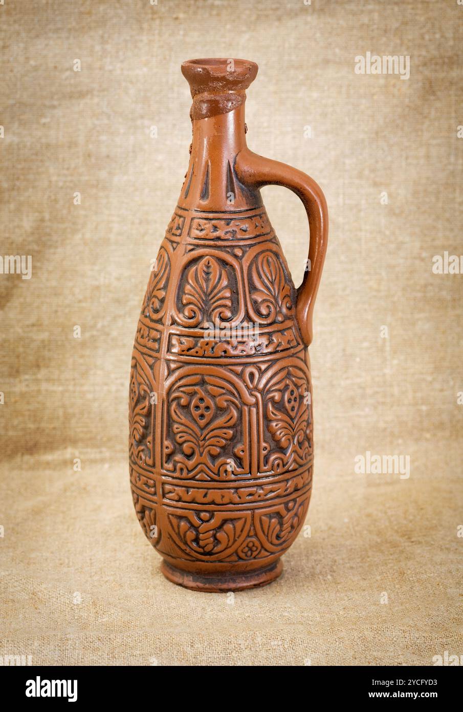 Ancient brown ceramic bottle Stock Photo - Alamy