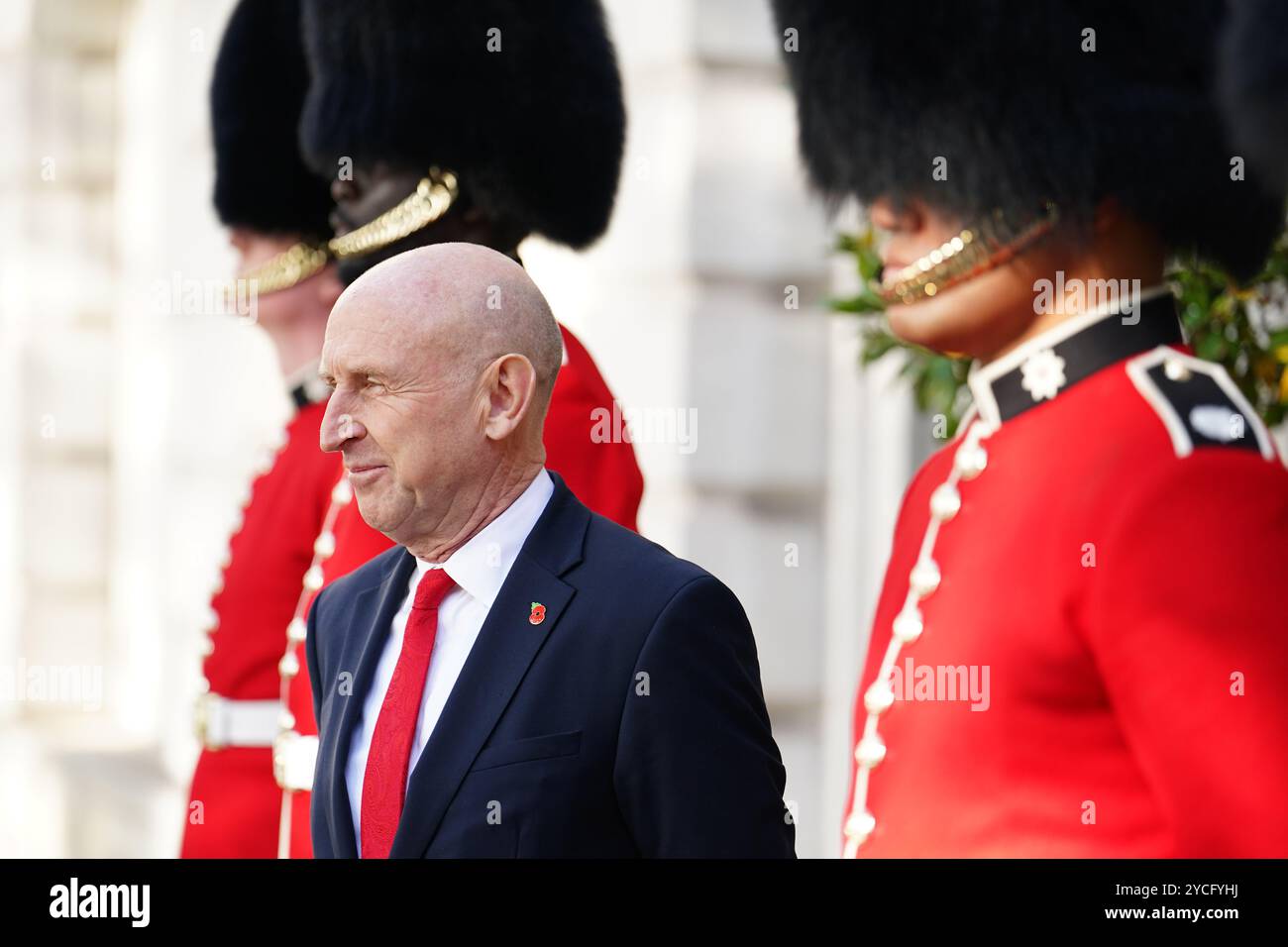Defence Secretary John Healey with members of the Coldstream Guards before his German ...