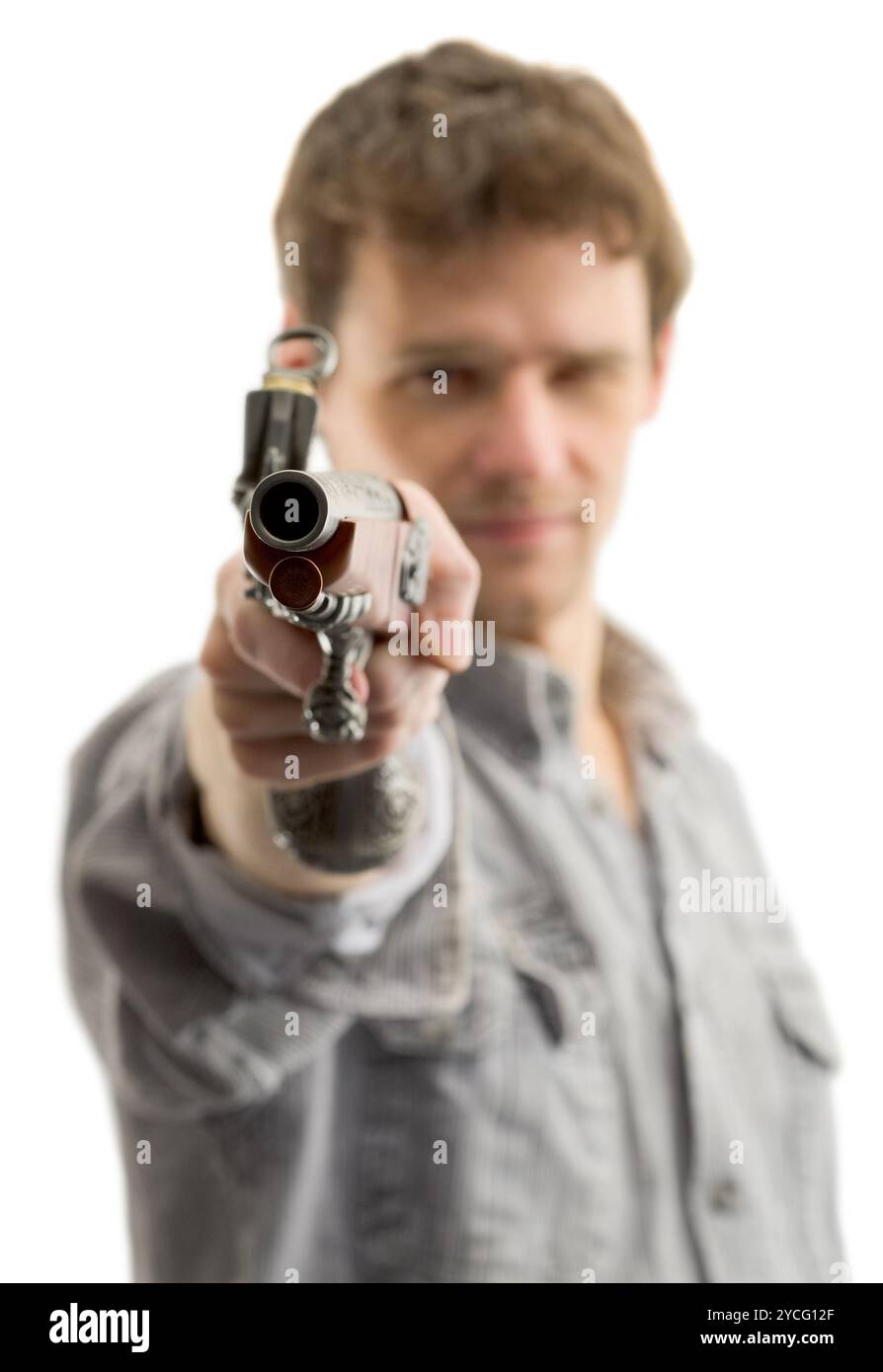 Man with pistol Stock Photo - Alamy