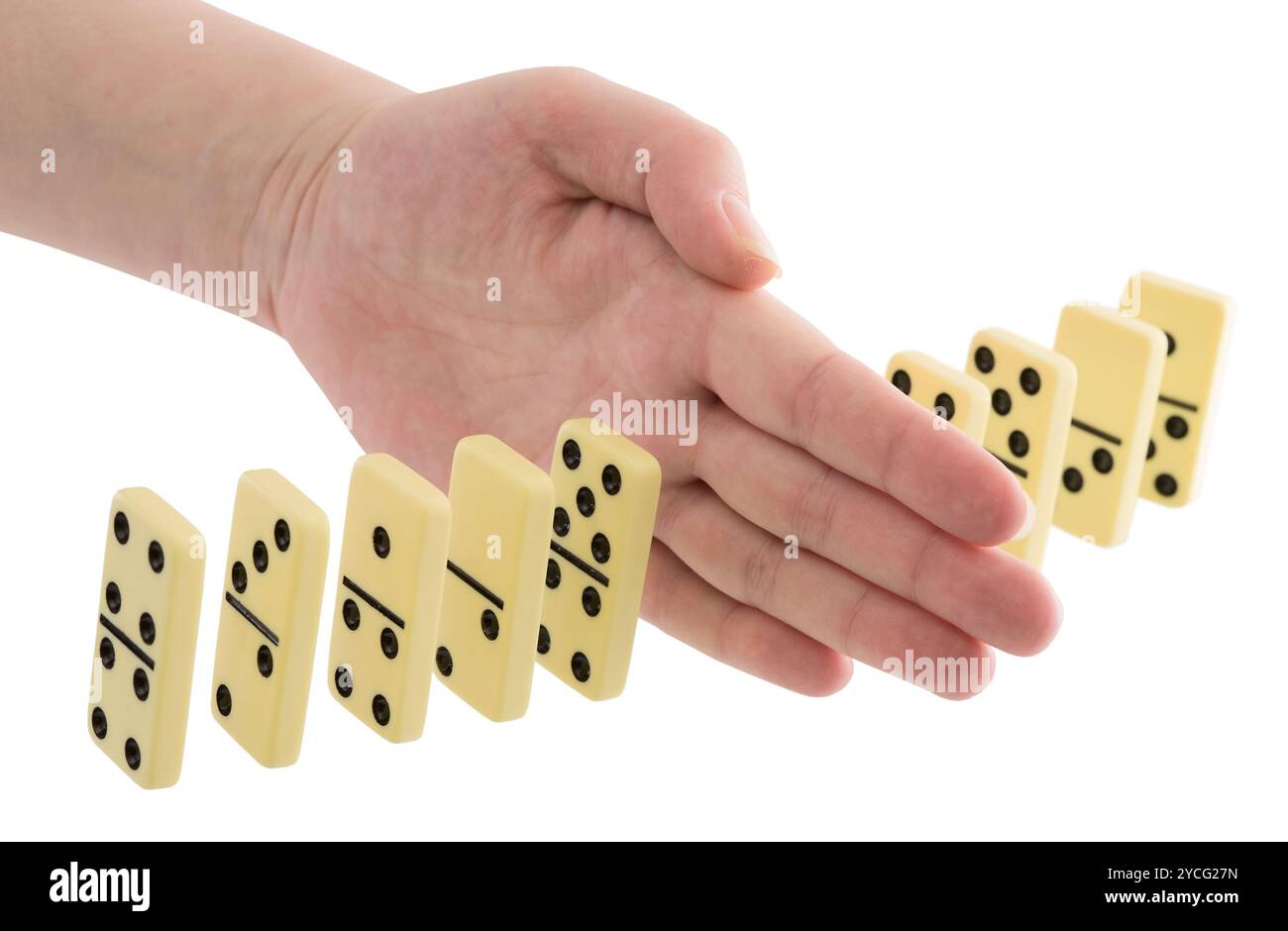 Bones of dominoes and hand Stock Photo - Alamy