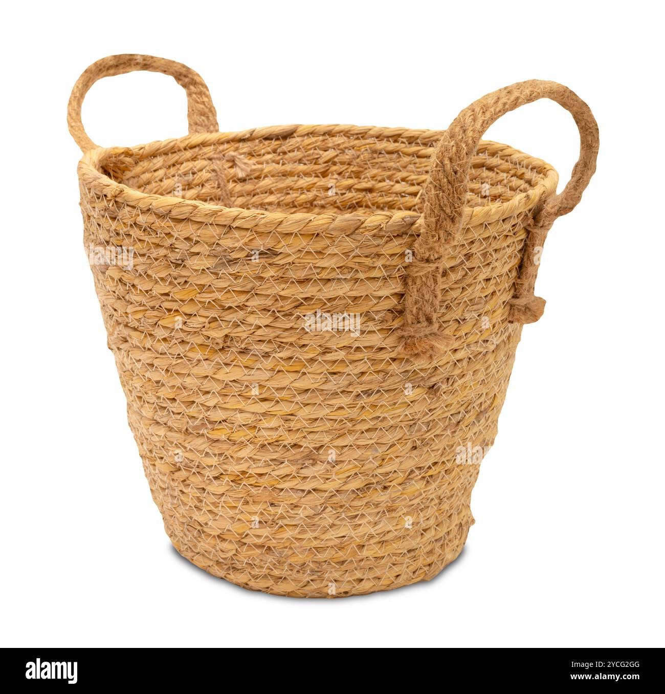 Handcrafted woven basket made from natural fibers, featuring two sturdy ...