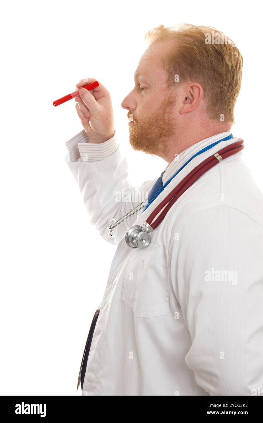 Doctor using an examination light. Side view. White background Stock ...